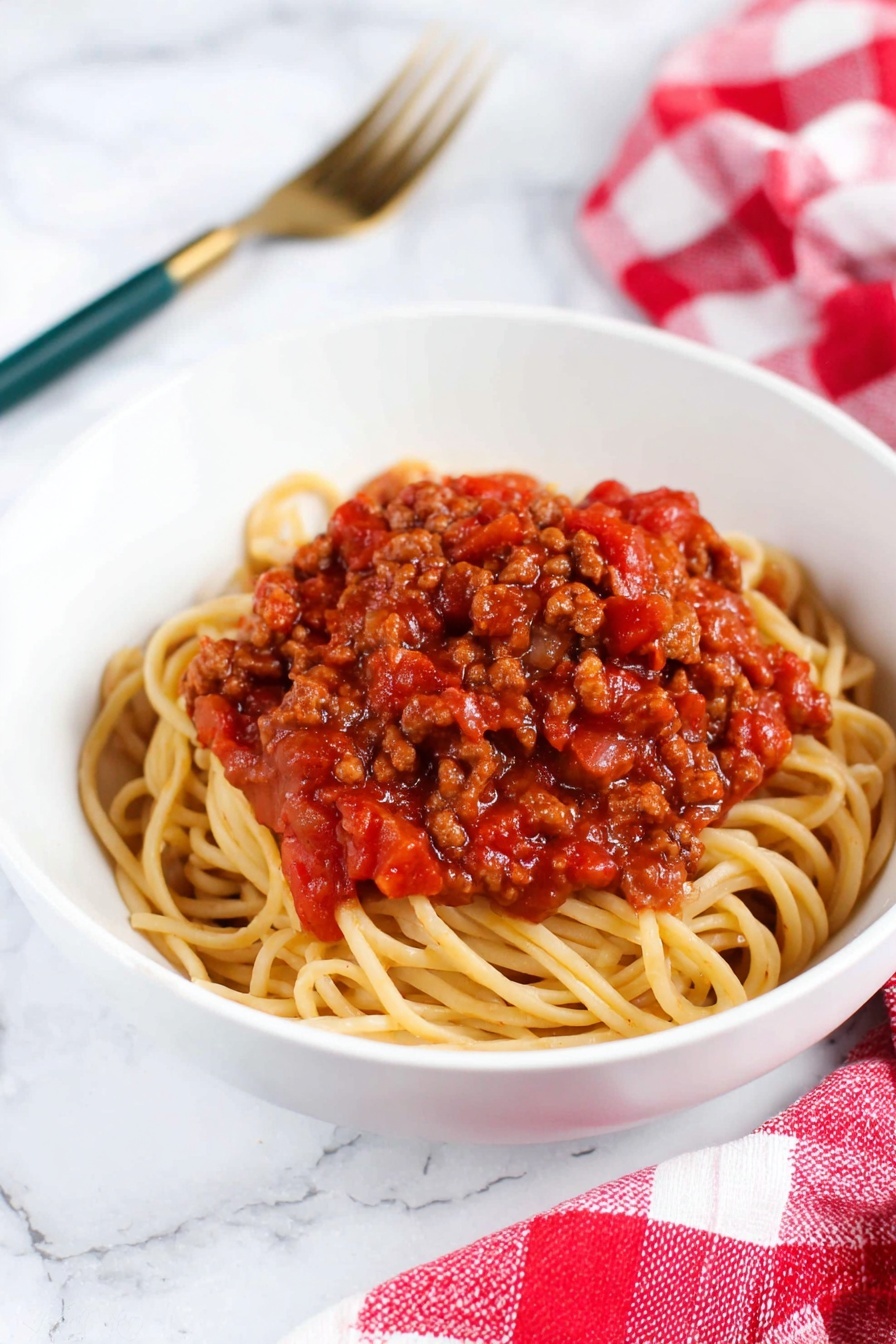 Filipino Spaghetti with Hot Dogs and Banana Ketchup - Delicious & Easy